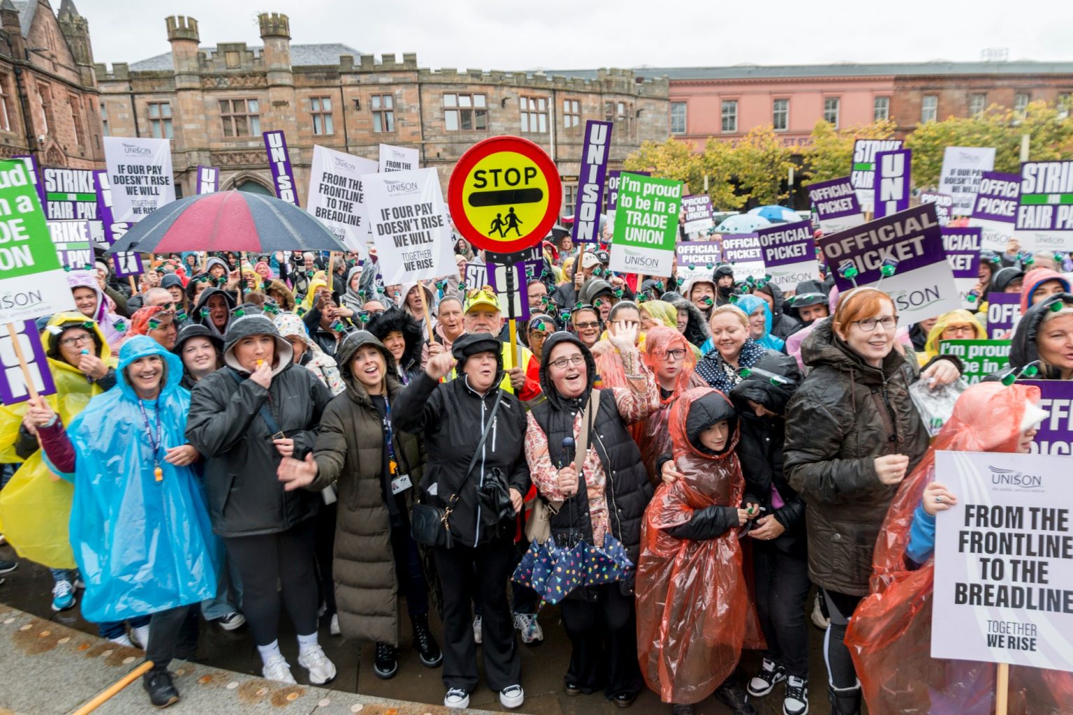 Striking UNISON school workers march to Renfrewshire Council HQ